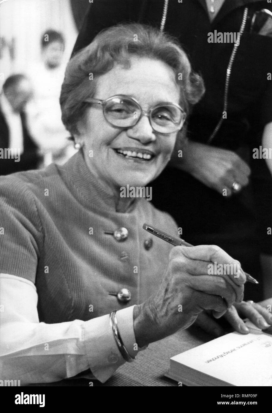 The former pilot Hanna Reitsch at an autograph session Stock Photo - Alamy