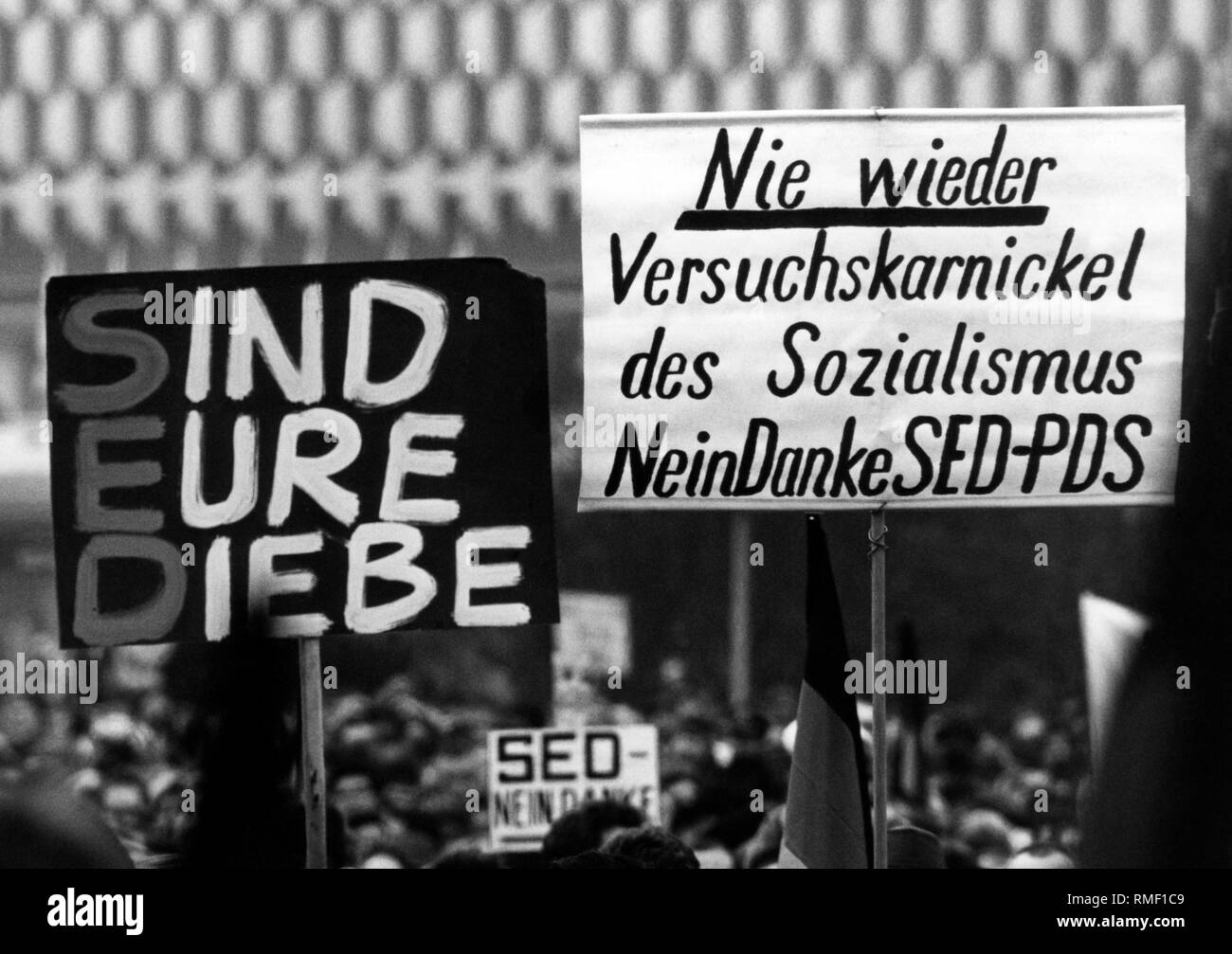 Anti-SED posters during the storm on the STASI headquarters in East ...