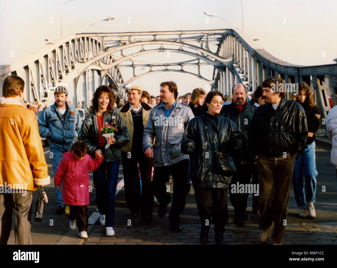 After the fall of the Berlin Wall numerous East Berliners visit West ...