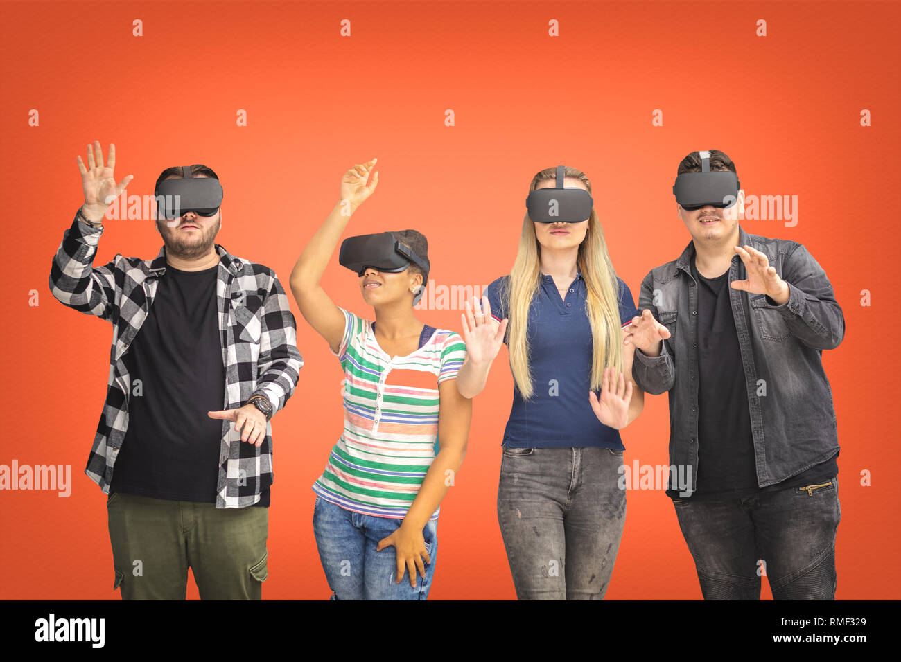 Multiracial friends group playing on vr glasses isolated on coral ...