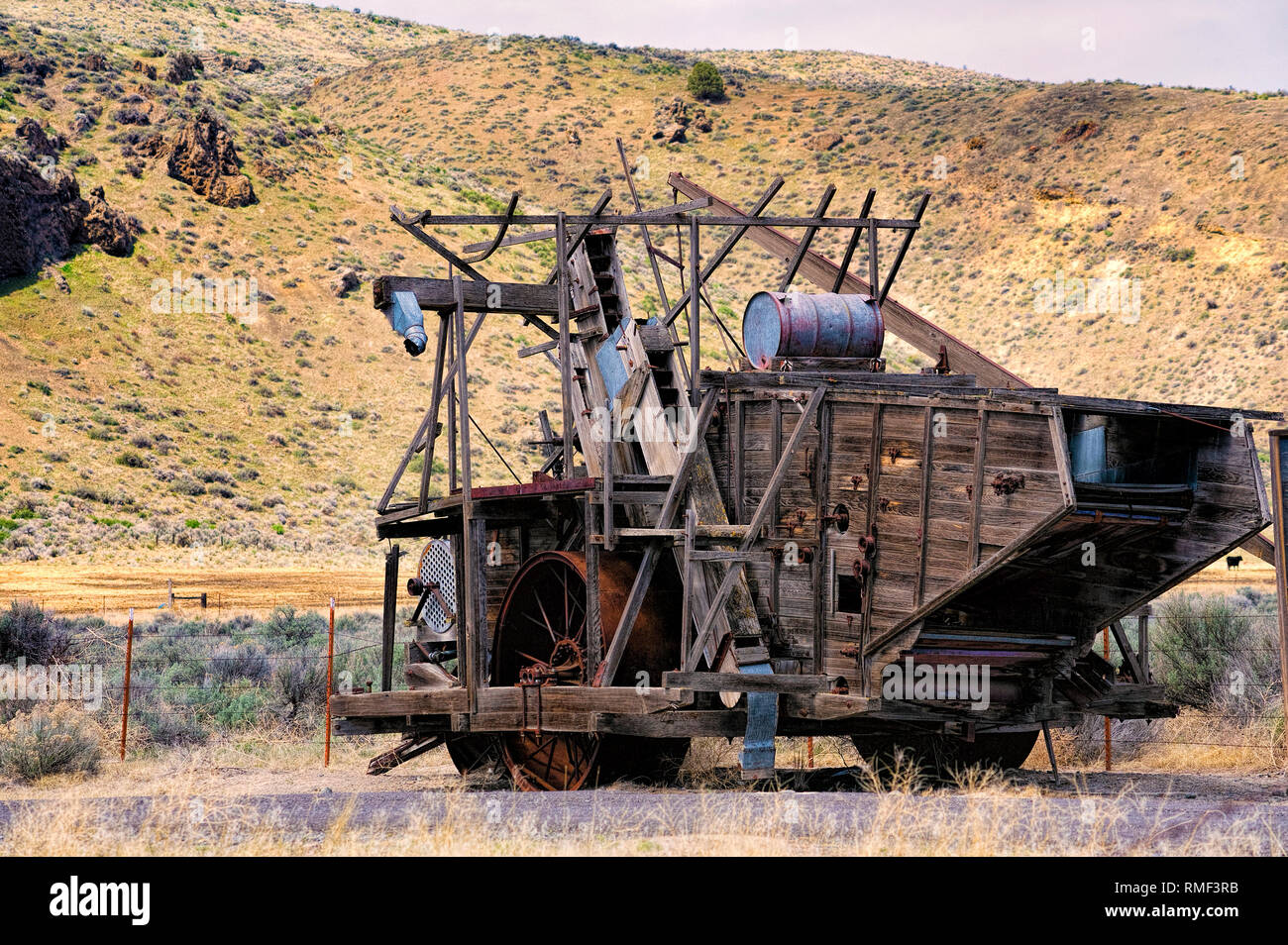 Old wooden combine for harvesting grain a relic of past times Stock ...