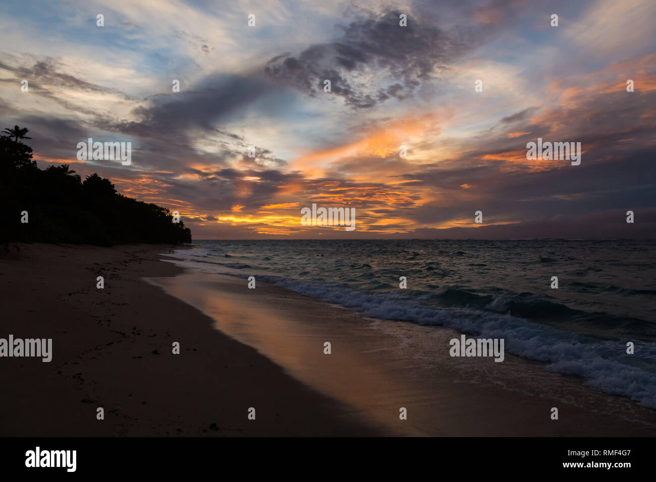 Twilight evening sunset. Waves, surf, swash at empty beautiful sandy ...