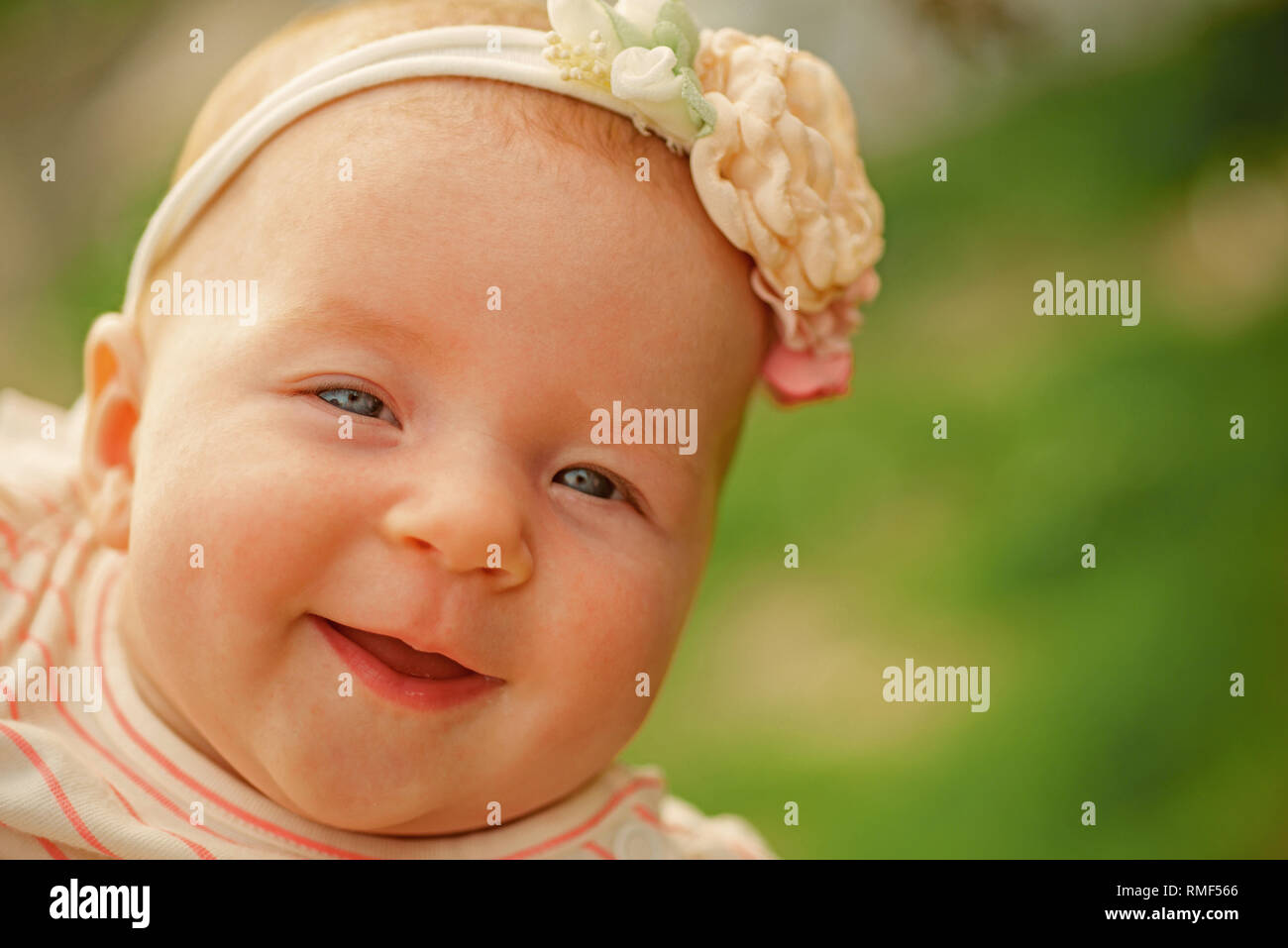 Happy little baby smiling. Happy newborn baby. Adorable little girl ...