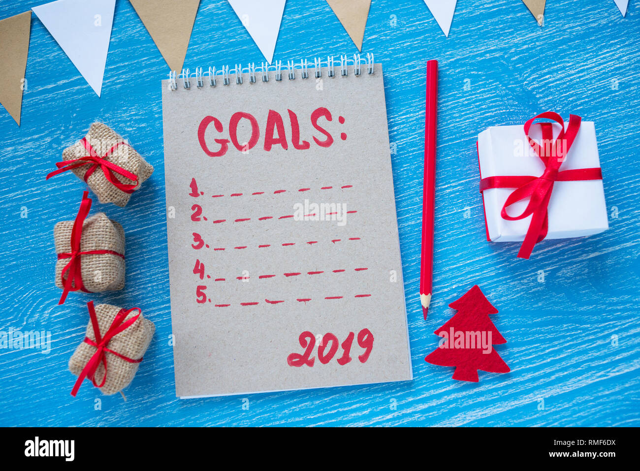 Top view of notepad with Goals List, plan concept Stock Photo - Alamy
