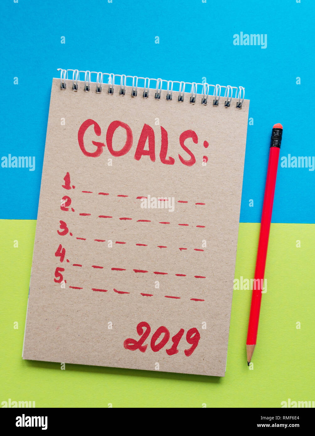 Top view of notepad with Goals List, plan concept Stock Photo - Alamy