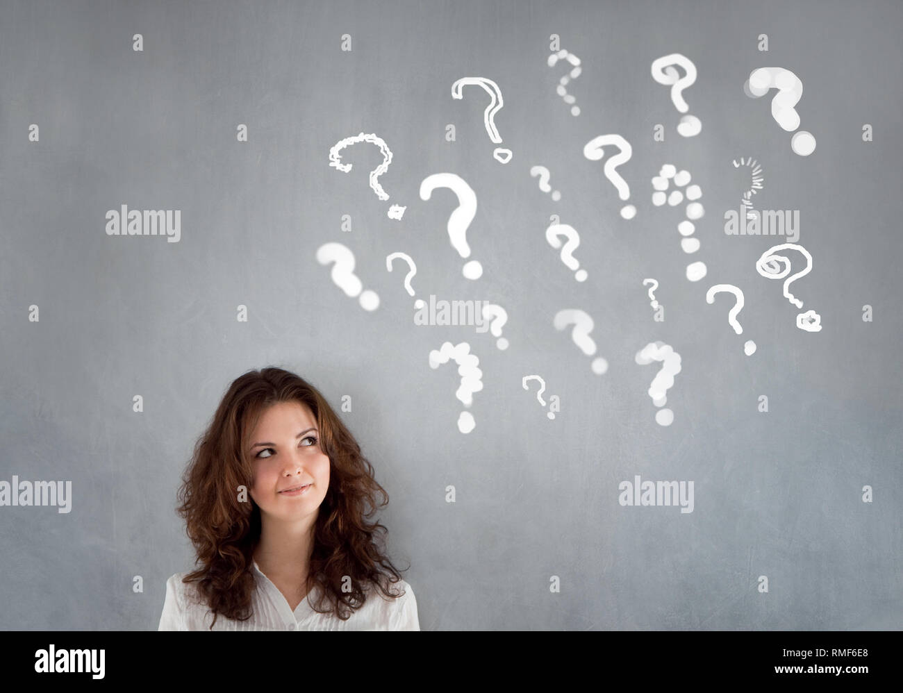 Woman thinking question mark hi-res stock photography and images - Alamy