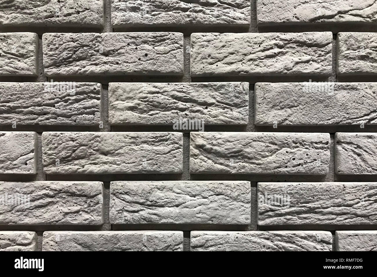 Grey brick wall texture background. Interior design concept with copy ...