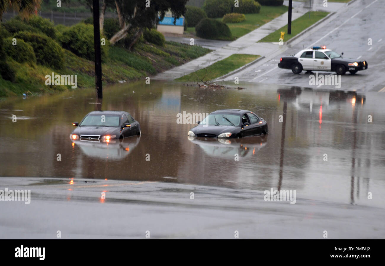Riverside, United States. 14th Feb, 2019. Cars are stranded in water on ...