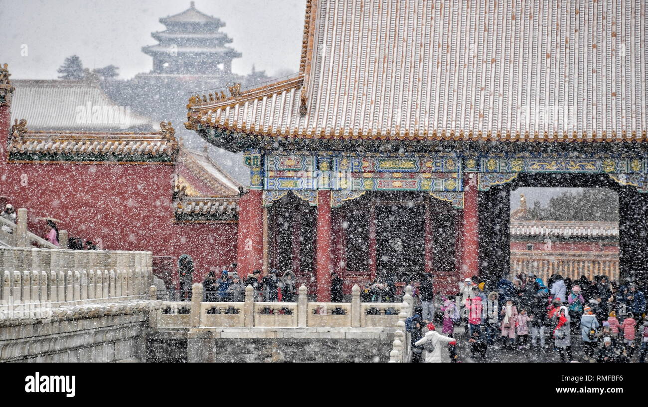 Beijing, China. 14th Feb, 2019. Visitors view the snowy scenery at the ...