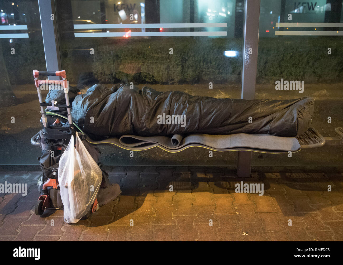 Homeless Sleeping Bus Stop High Resolution Stock Photography and Images ...