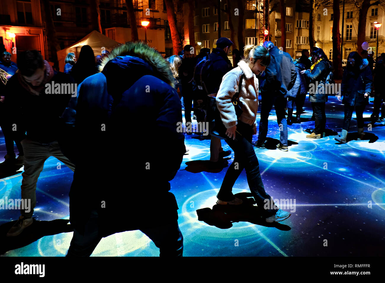 Brussels, Belgium. 14th Feb, 2019. Visitors view an artistic light ...
