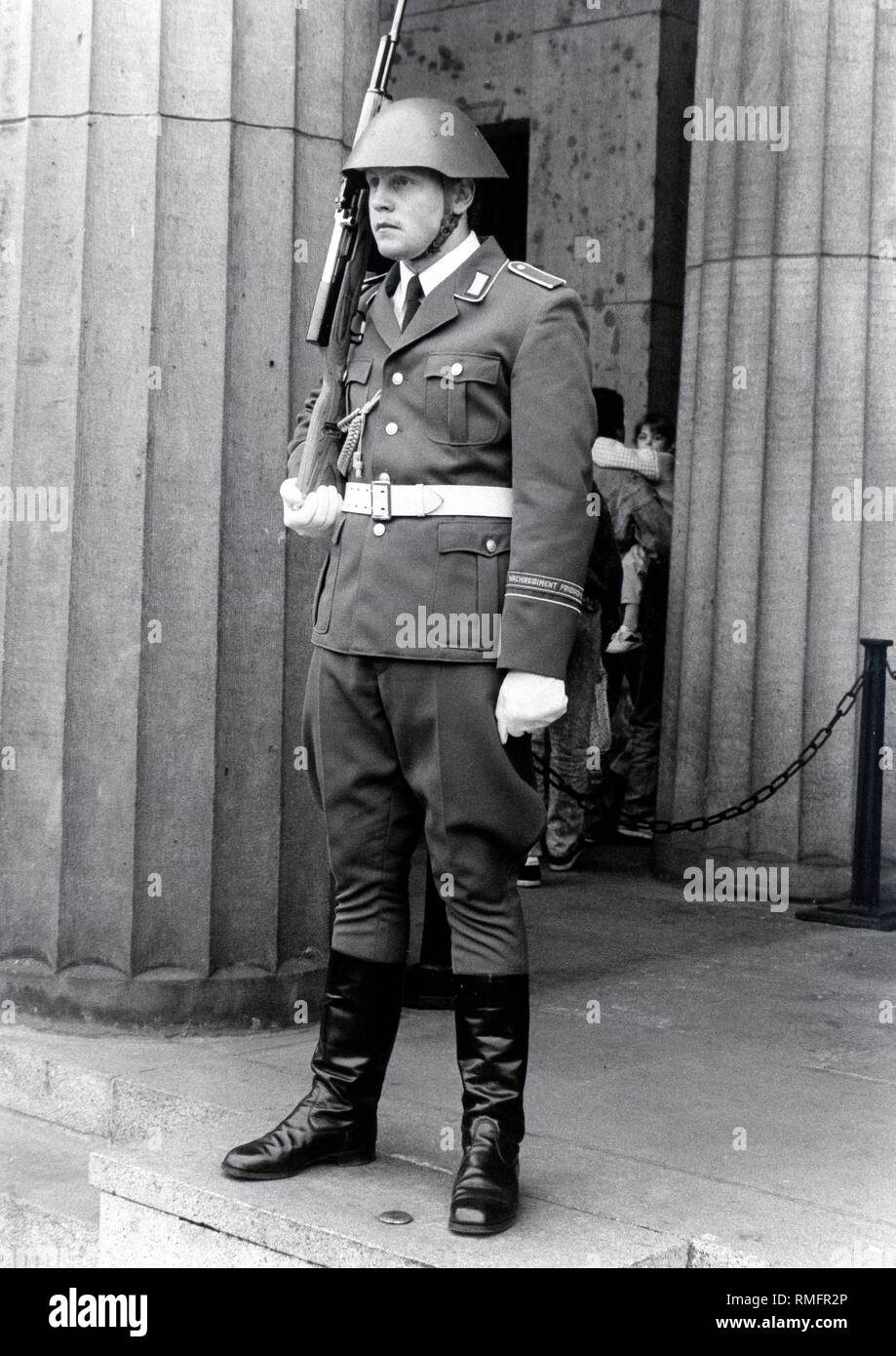 Guard of the GDR army with rifle in front of the Neue Wache on the ...