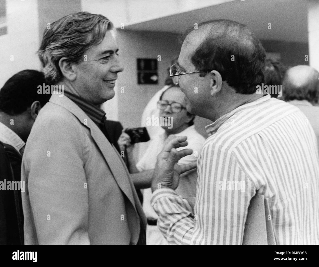 Mario Vargas Llosa (left), Peruvian writer and politician talking to ...