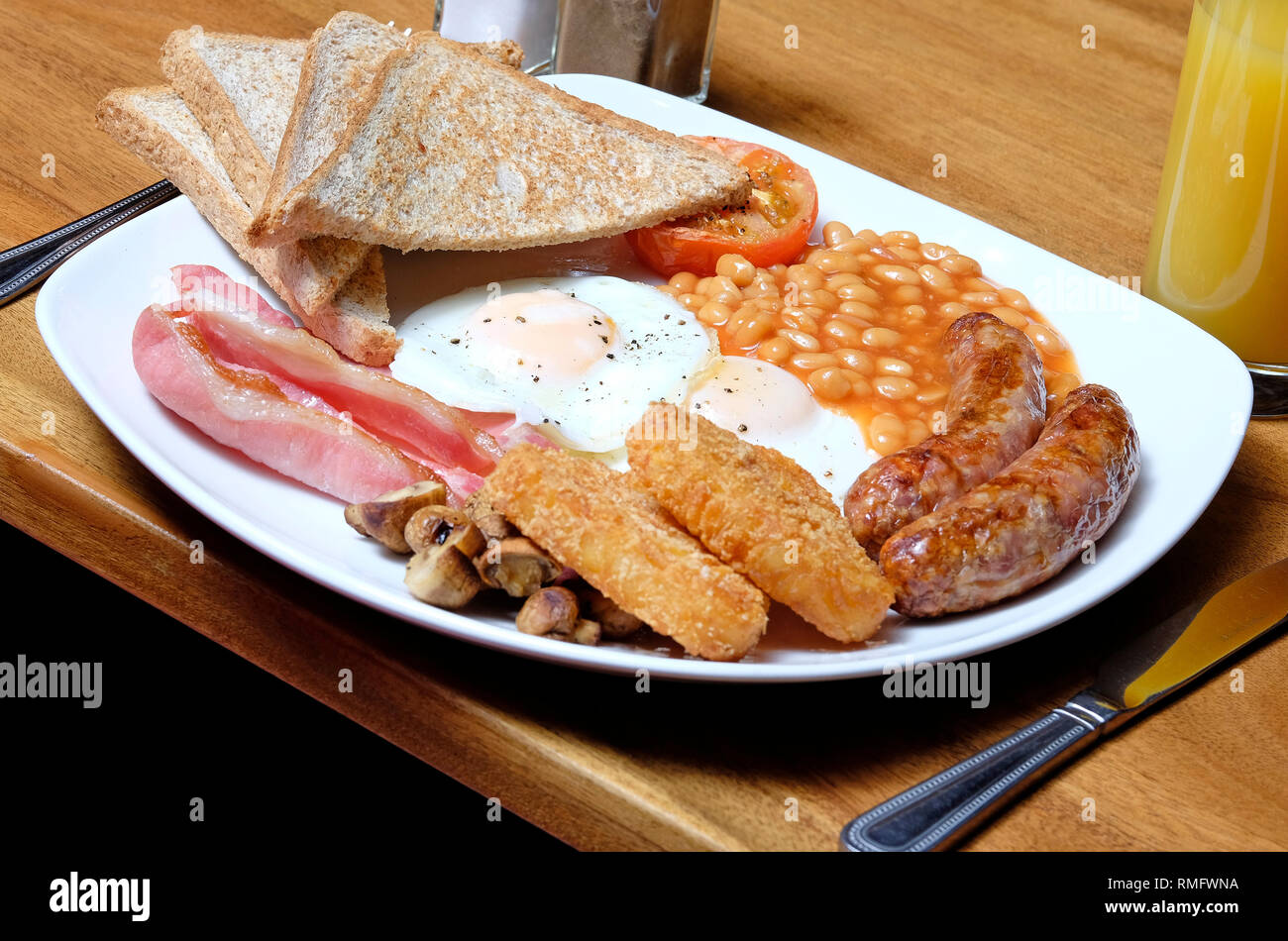 full english breakfast on white plate Stock Photo - Alamy