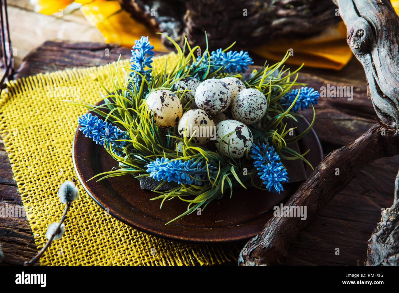 Easter table setting. Fresh eggs on plate. Spring table Stock Photo - Alamy