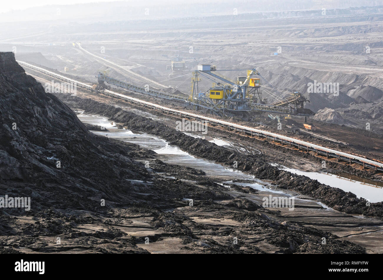 coal mine with excavator machine. mining industry Stock Photo - Alamy