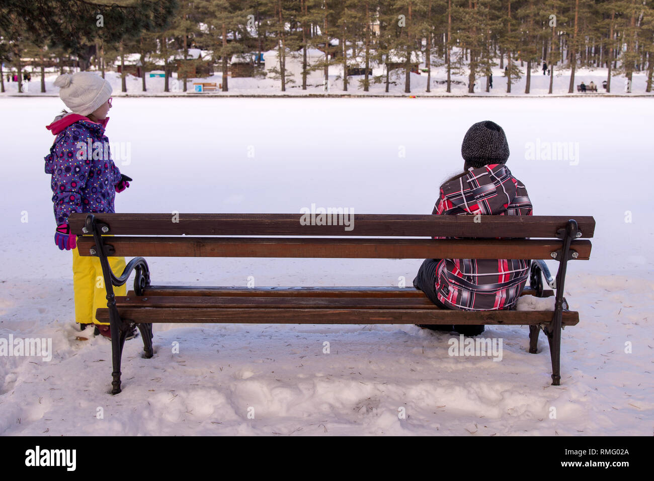 Two girls on the bench Stock Photo - Alamy