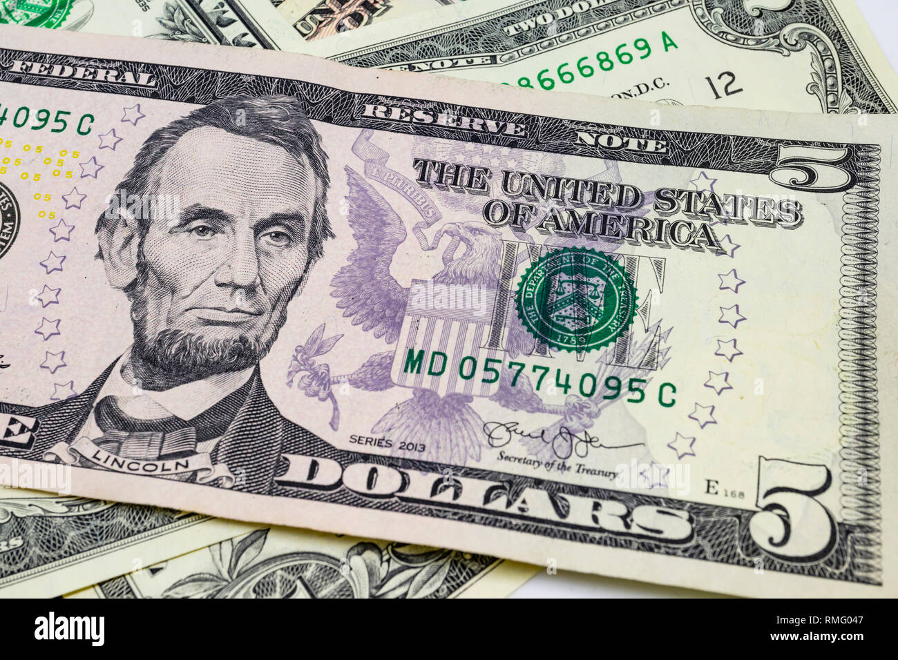 a pile of banknote dollars on hand as part of the world trade and ...