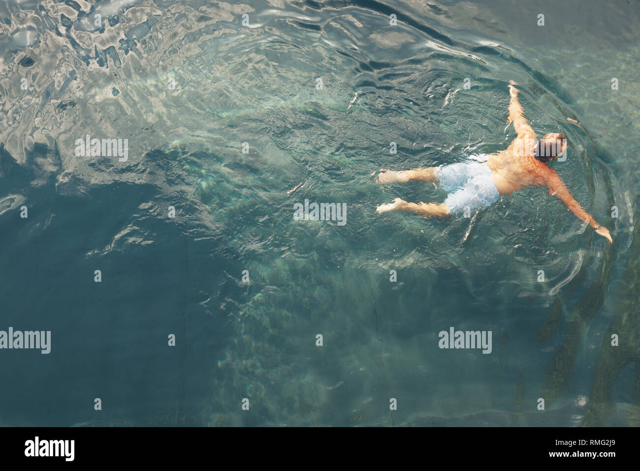 Man And Water Splash High Resolution Stock Photography and Images - Alamy