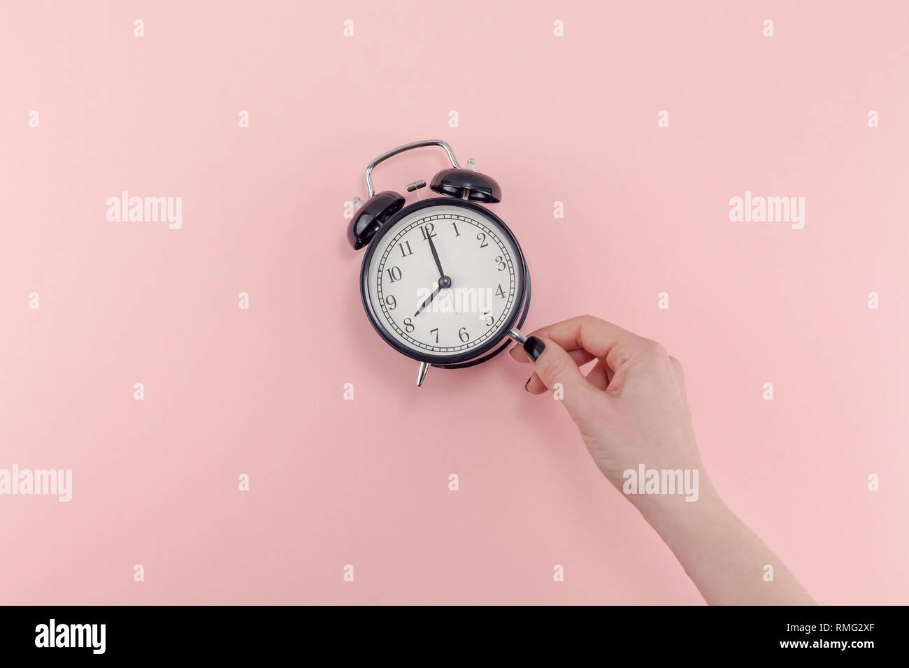 Creative flat lay morning time emotions concept top view of woman hand ...