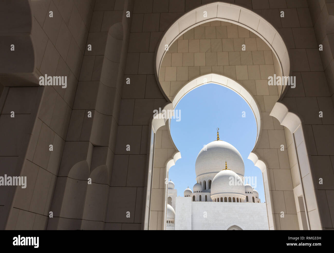 View of fantastic white palace through amazing arches on sunny day in ...