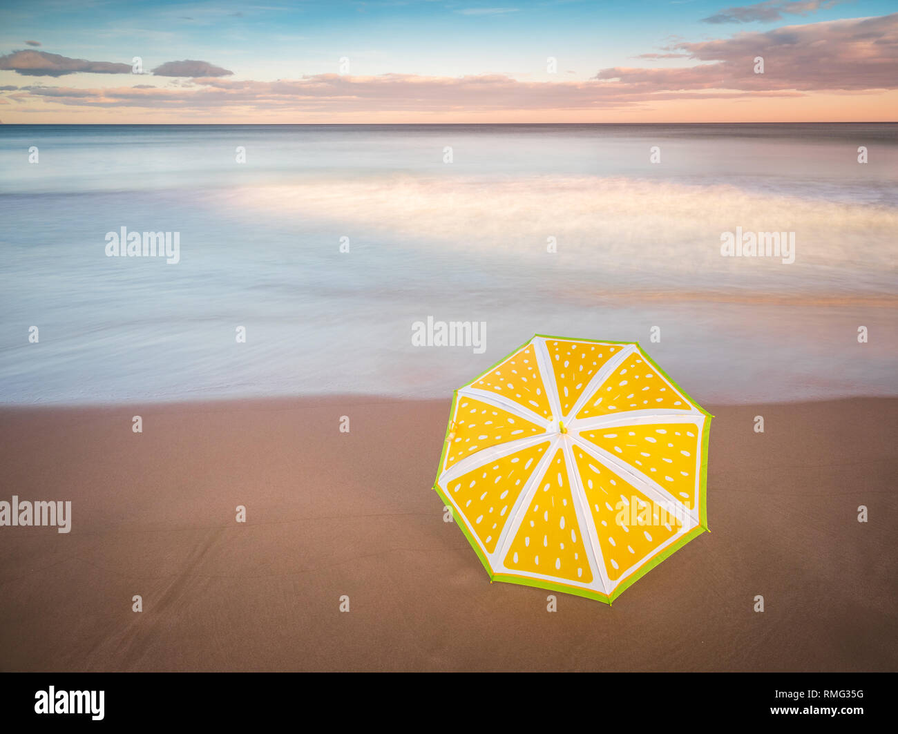 Umbrella on beach near sea Stock Photo - Alamy