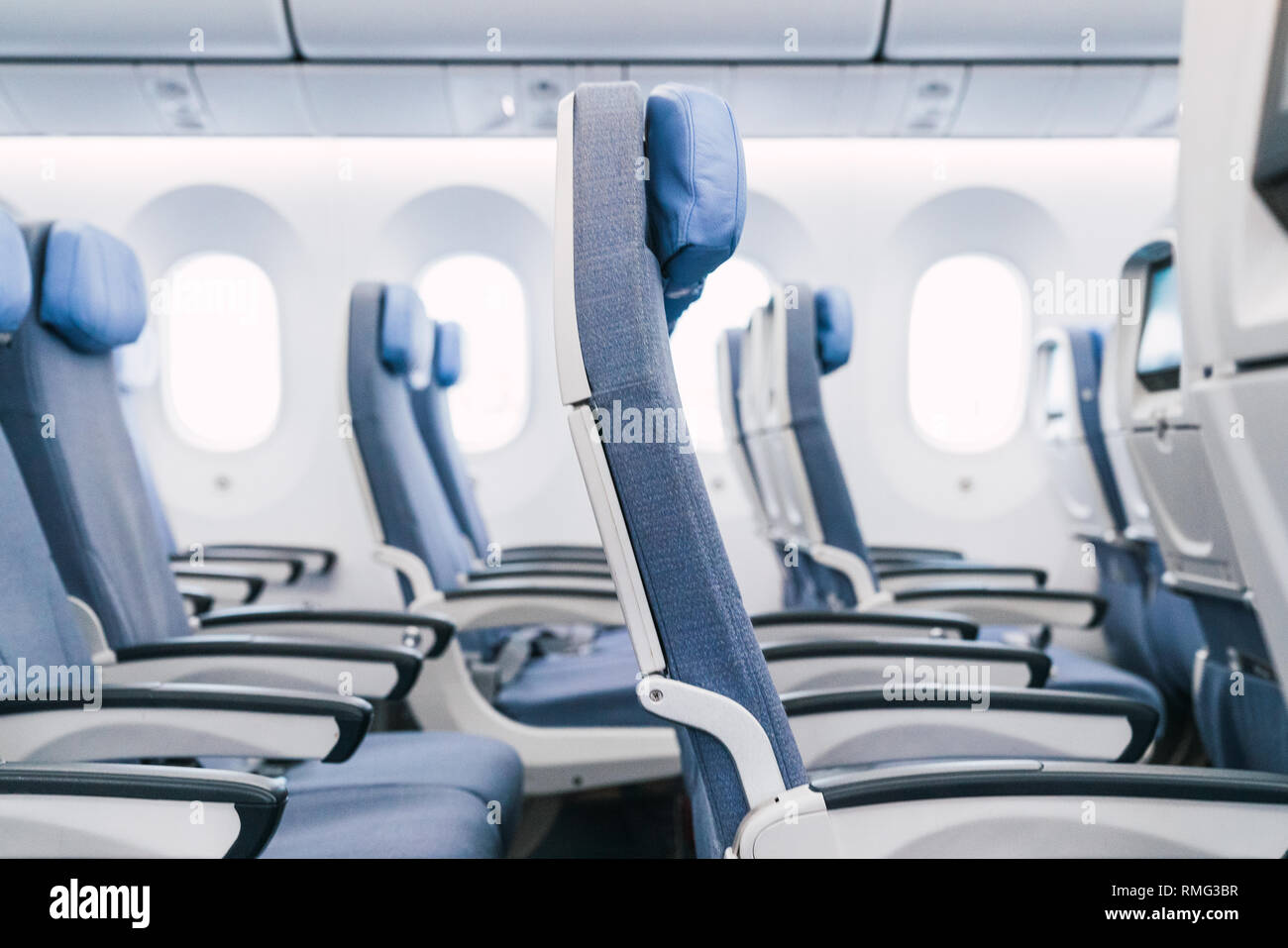 Aisle in modern plane cabin Stock Photo - Alamy