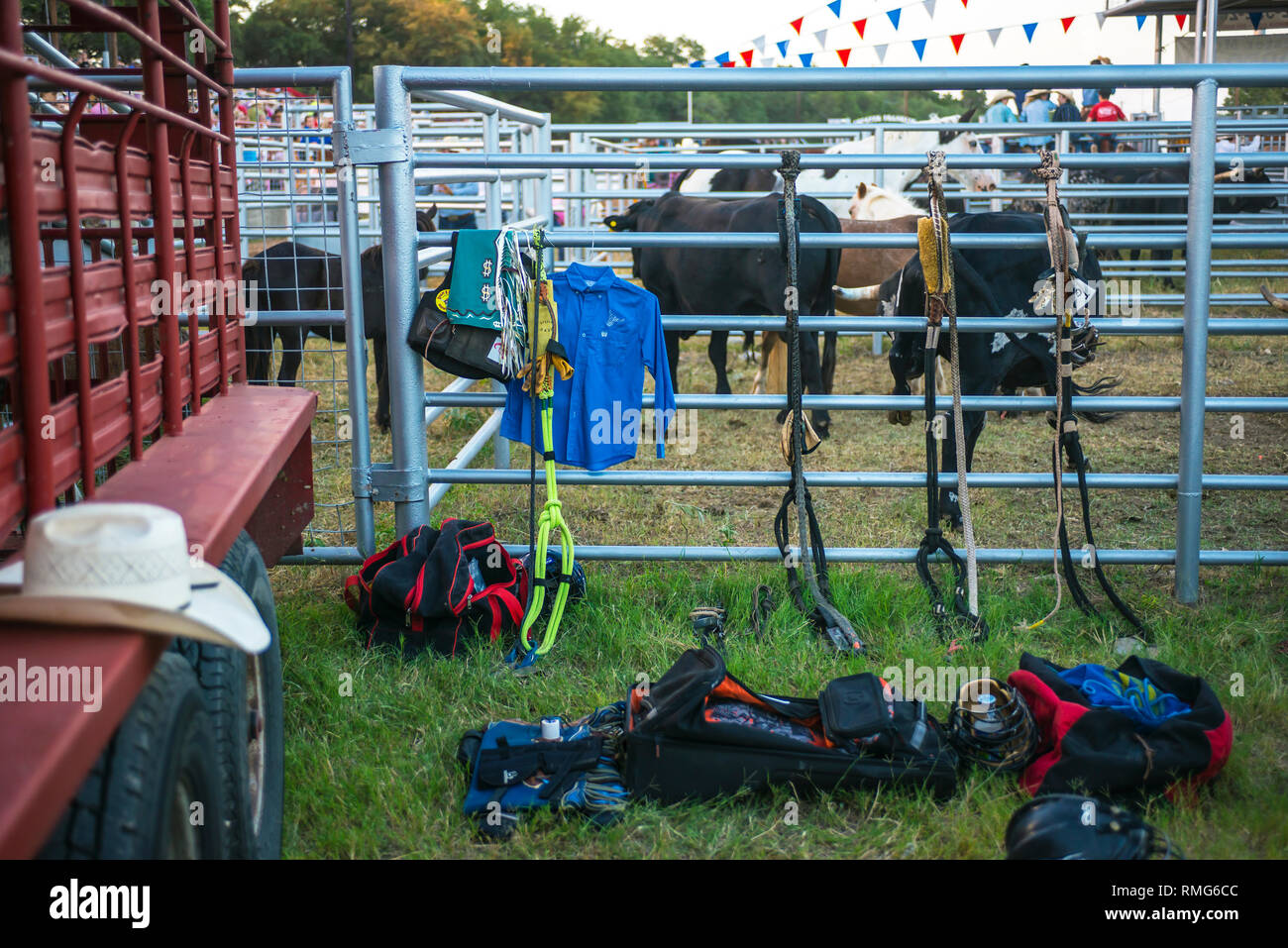 Cowboy hat and rodeo equipment on fence Stock Photo - Alamy