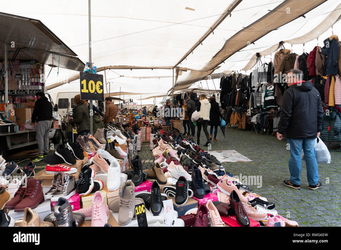 Portuguese outdoor market day on rainy day Stock Photo - Alamy