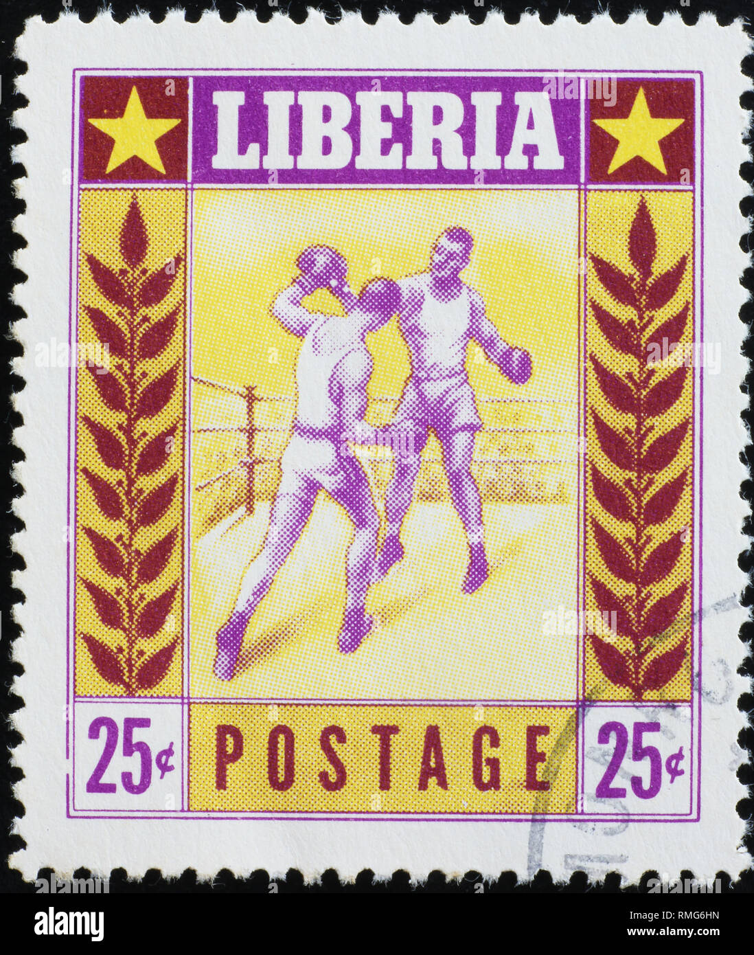 Boxers fighting on old postage stamp of Liberia Stock Photo - Alamy