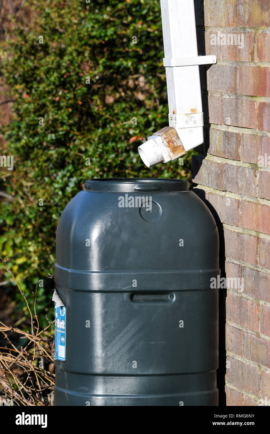 water butt being fed by plastic down pipe Stock Photo - Alamy