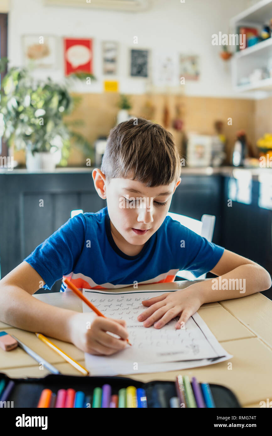 Boy drawing assignment hi-res stock photography and images - Alamy