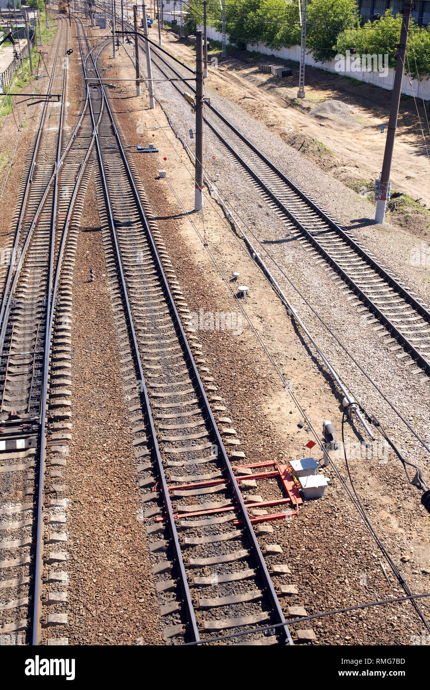 Railroad tracks on concrete sleepers, arrows and track equipment Stock ...