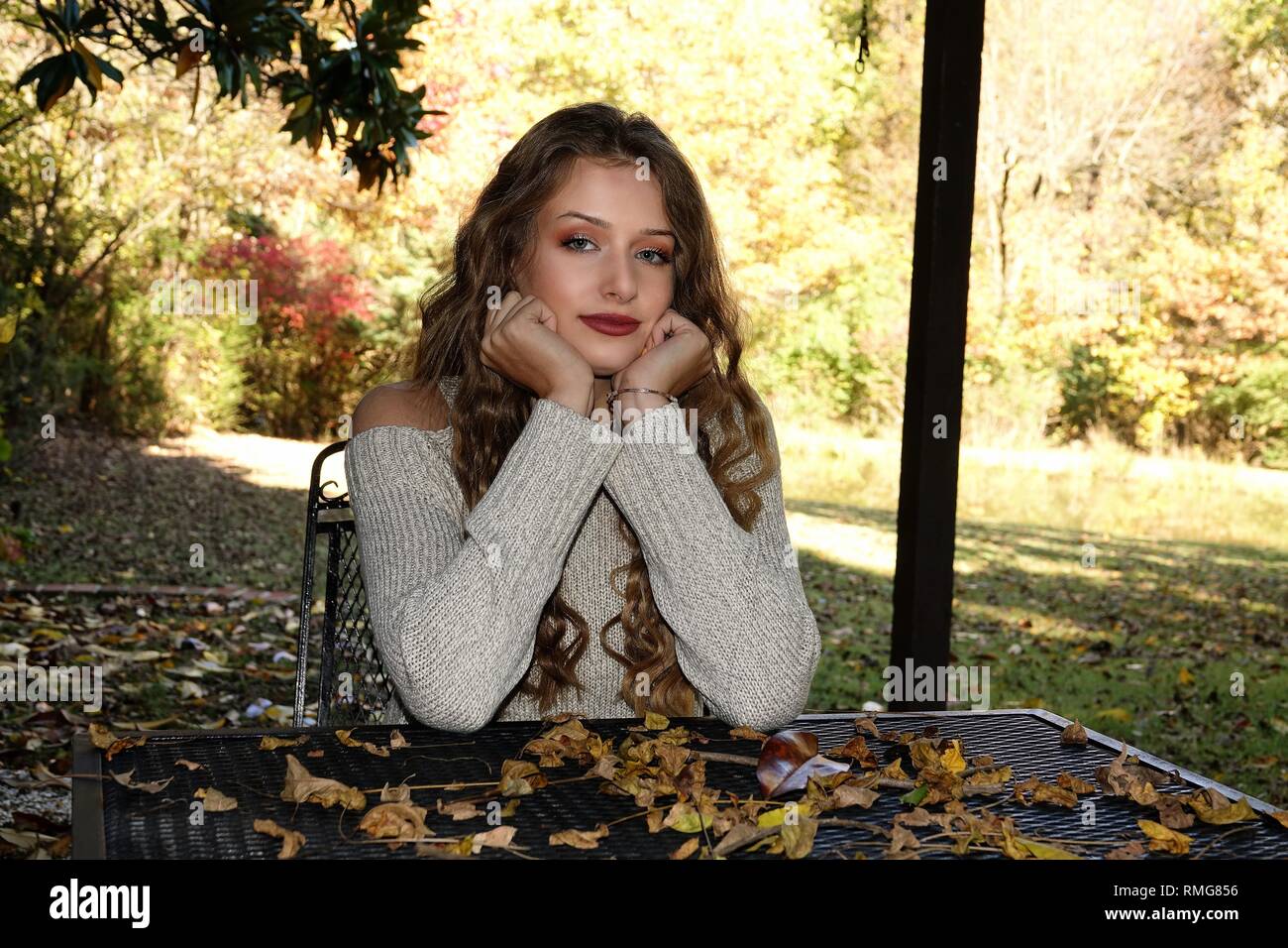 Beautiful country girl in a Fall country setting Stock Photo - Alamy