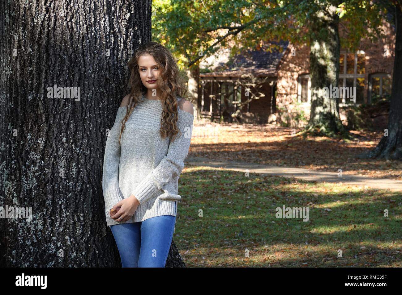 country young woman in a Fall country setting Stock Photo - Alamy