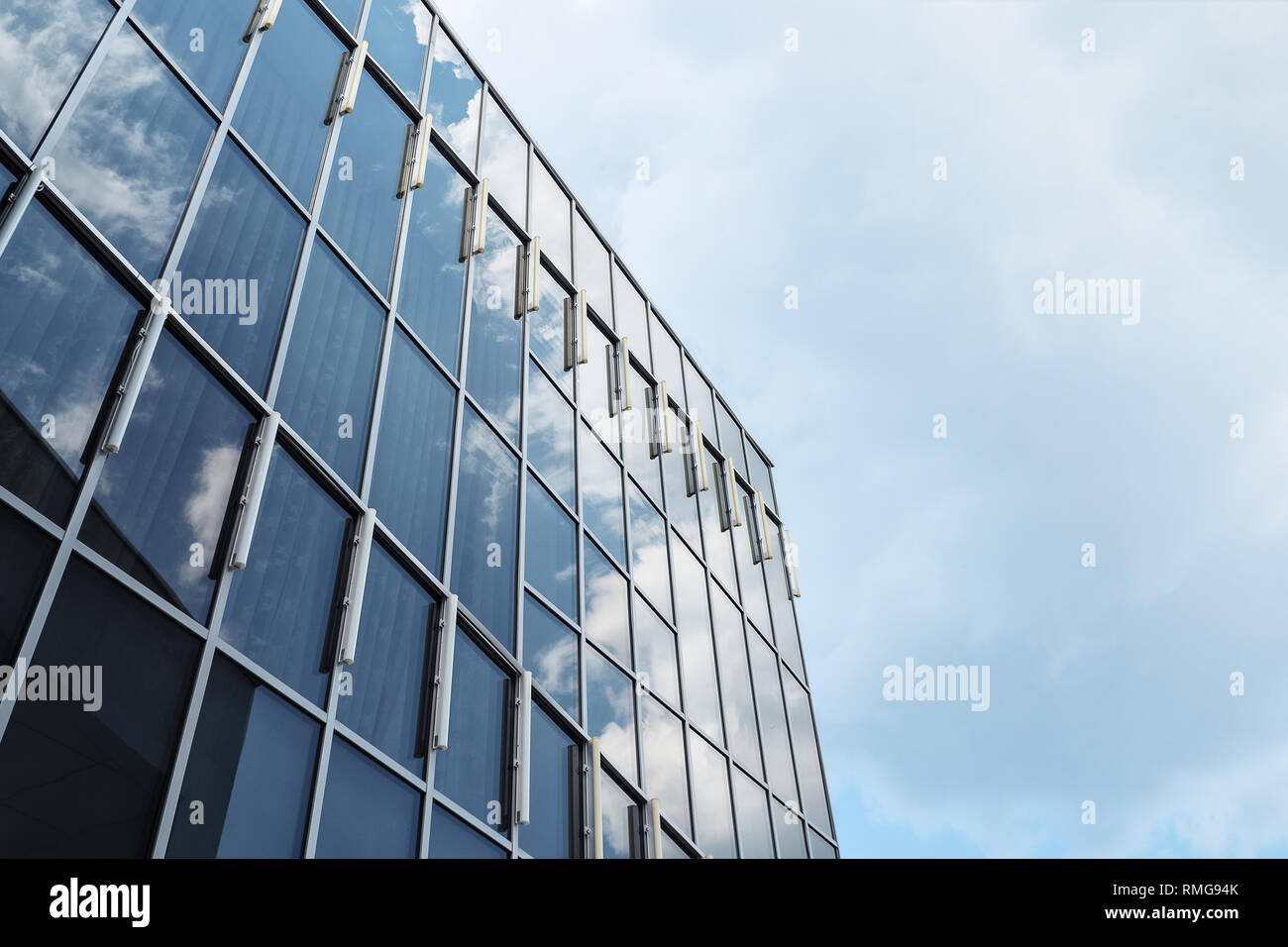 Glass walls of a office building - business background Stock Photo - Alamy
