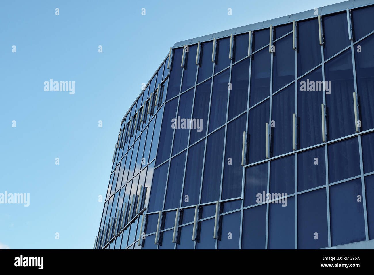 Glass walls of a office building - business background Stock Photo - Alamy