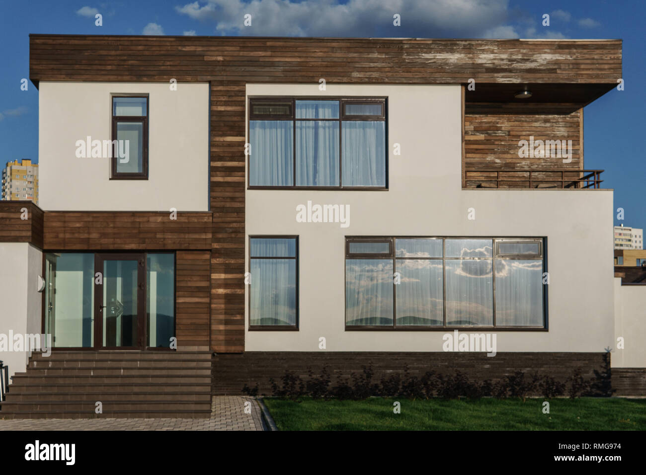 Two-storey house without a fence on the outskirts of the city Stock ...