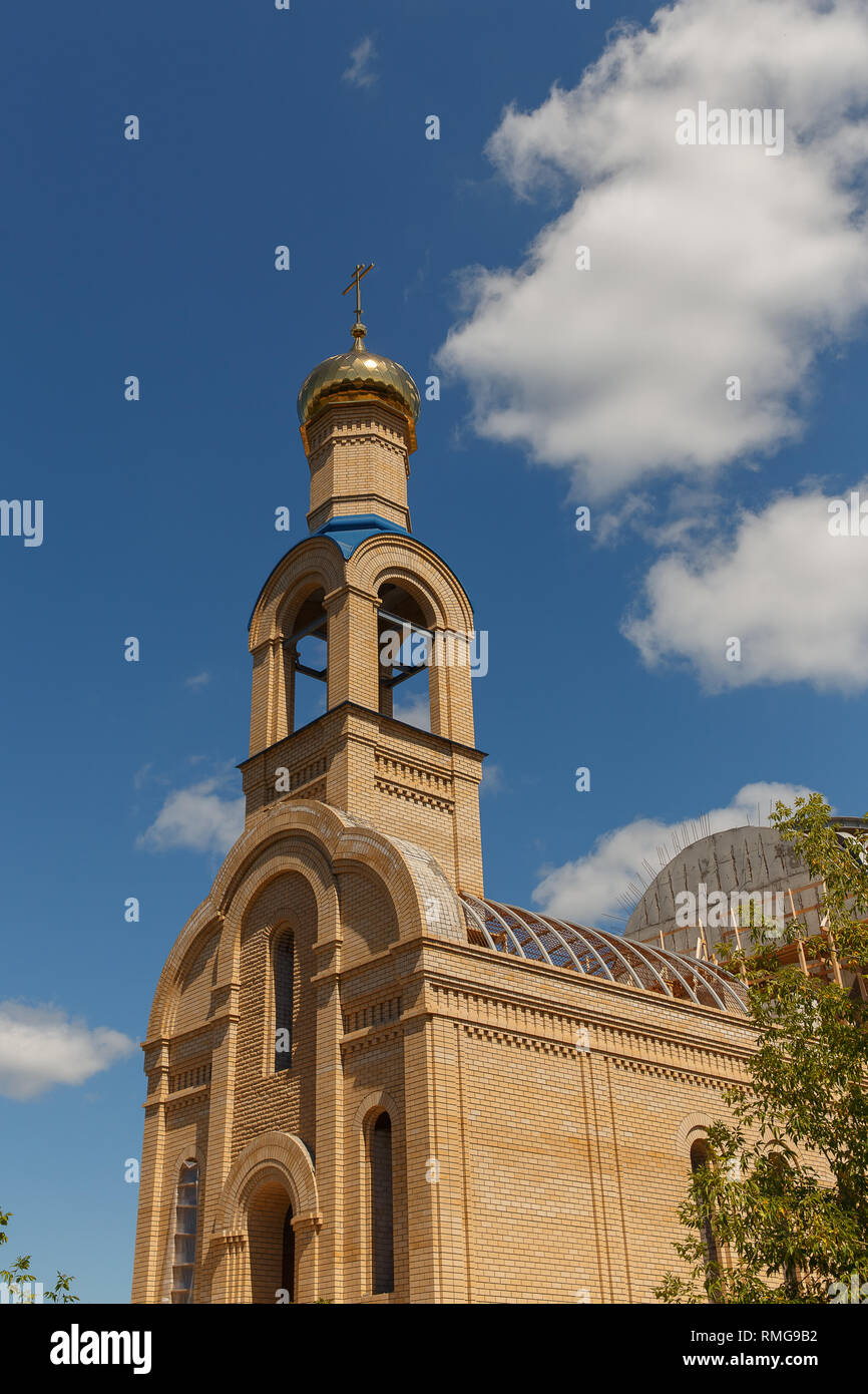 The restored church against the blue sky Stock Photo - Alamy