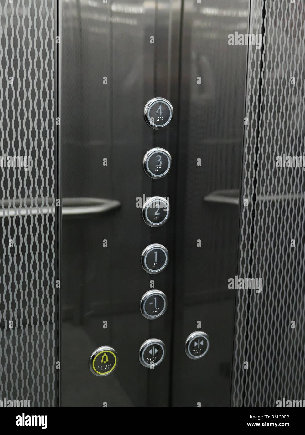 Interior and closeup of metal buttons in elevator Stock Photo - Alamy