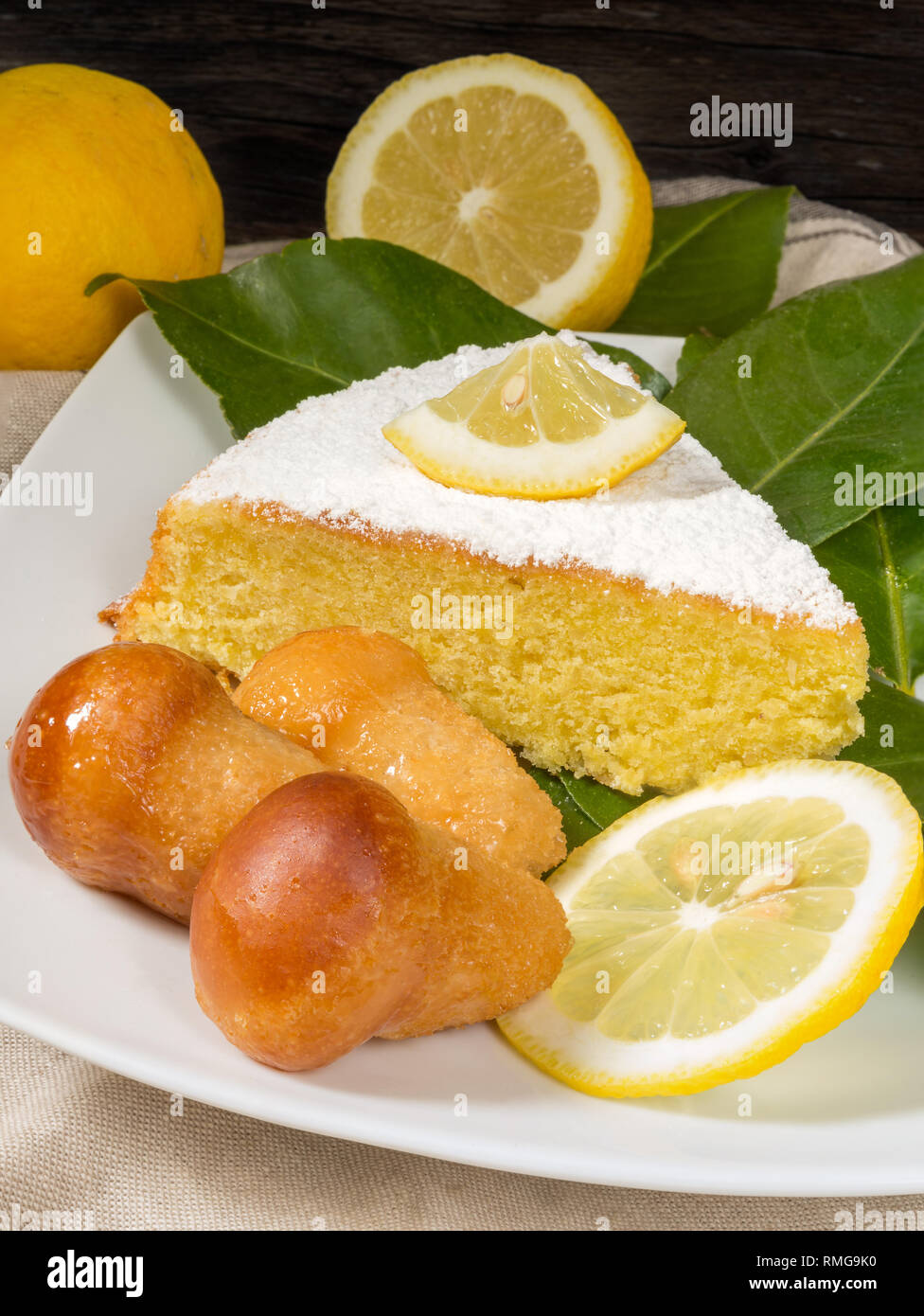 Typical neapolitan dessert called baba and lemon caprese cake Stock ...