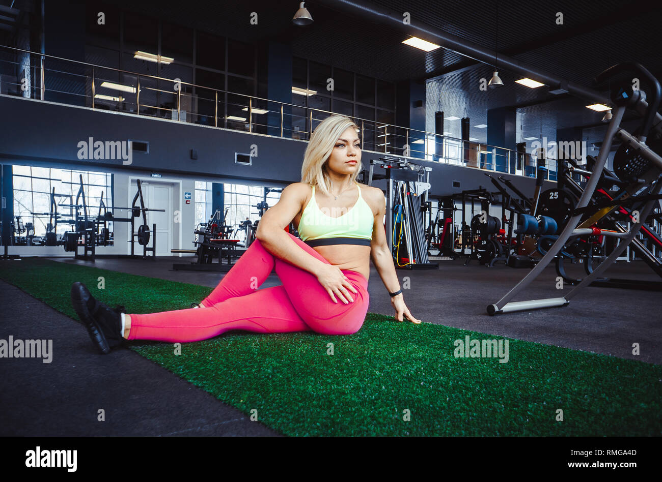 woman doing leg stretching, in a butterfly pose Stock Photo - Alamy