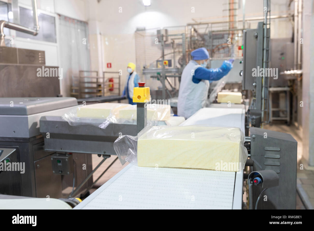 Worker packs butter at the dairy plant Stock Photo - Alamy