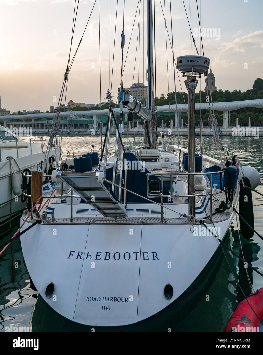 Yacht sailboat named freebooter berthed in Malaga harbour at dusk ...
