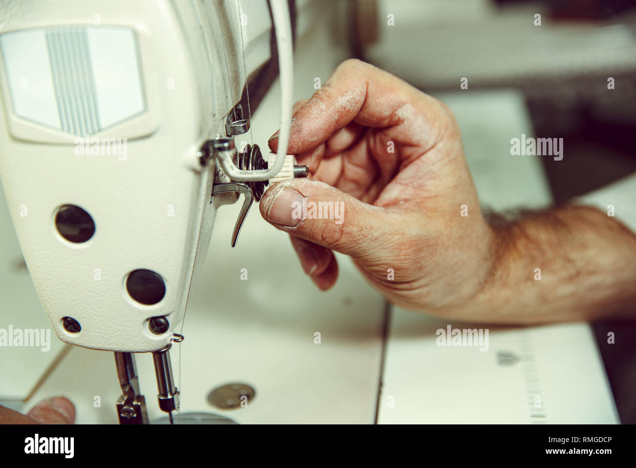 Person retro sewing machine hi-res stock photography and images - Alamy