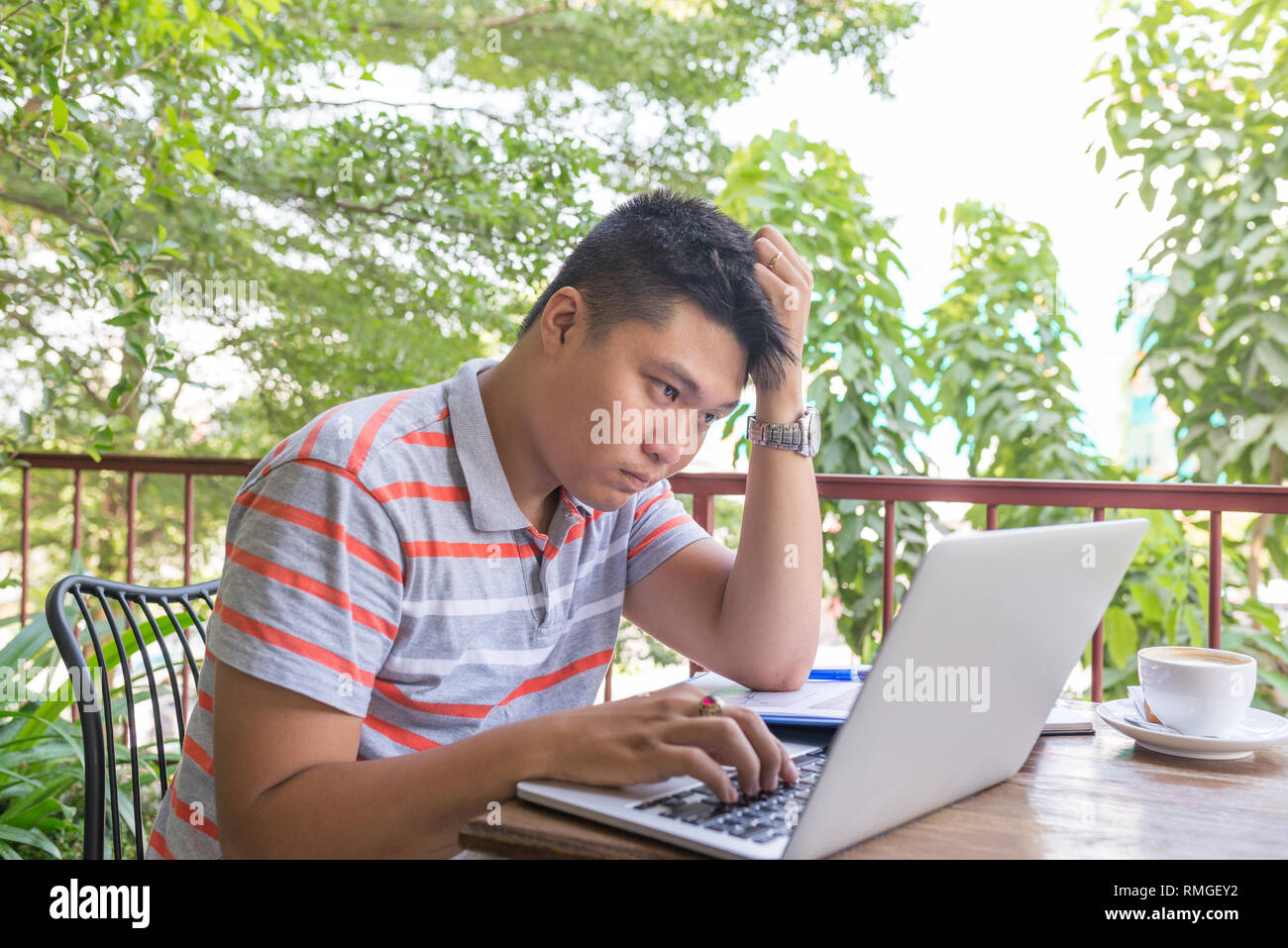 Sad tired asian man hi-res stock photography and images - Alamy