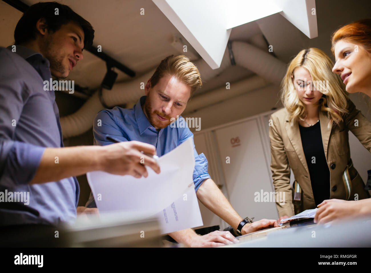 Creative workers designing and planing Stock Photo - Alamy