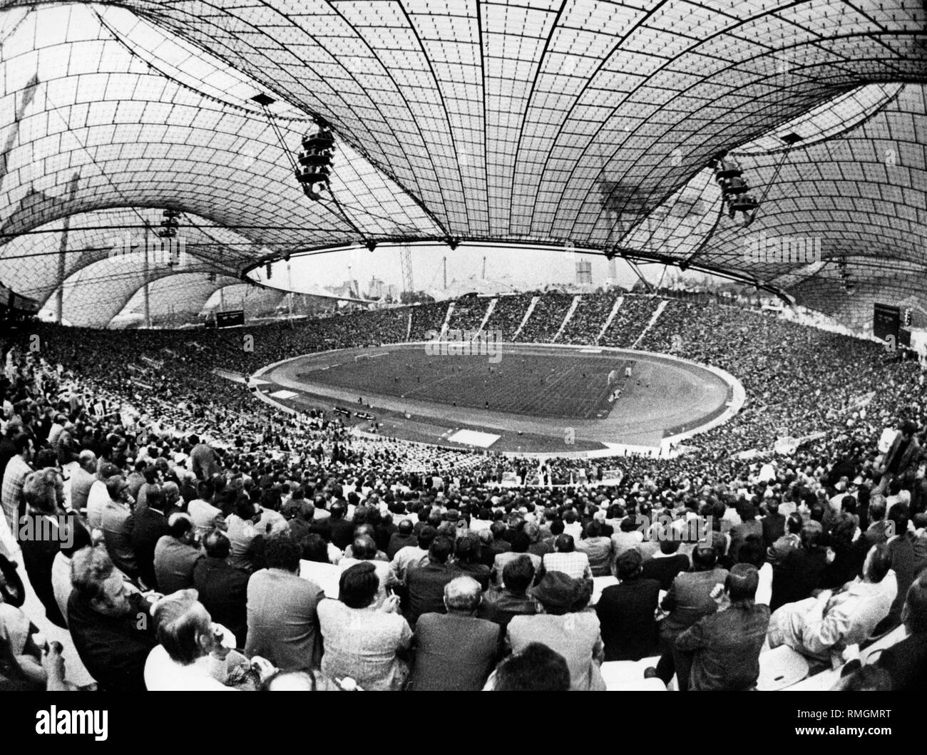 The Munich Olympic Stadium opened in front of 80,000 spectators, with a ...