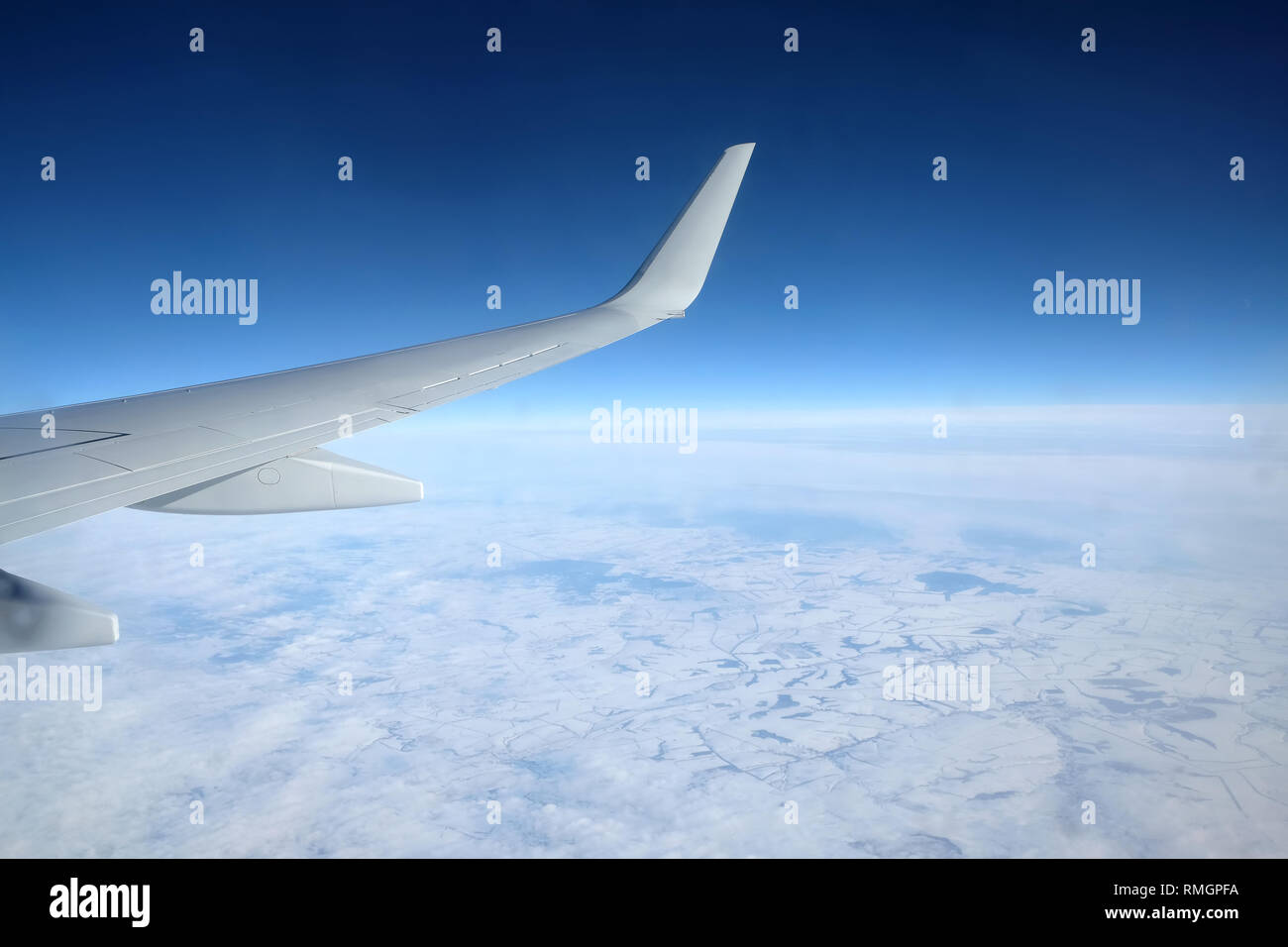 Beautiful top view of large snow fields from passenger supersonic ...