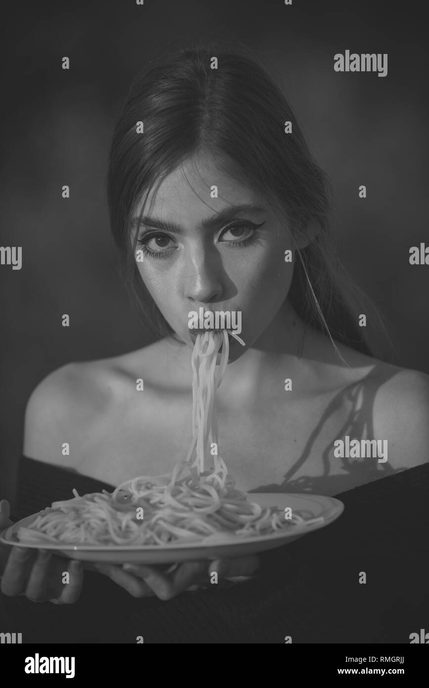 Woman eating spaghetti italy hi-res stock photography and images - Alamy